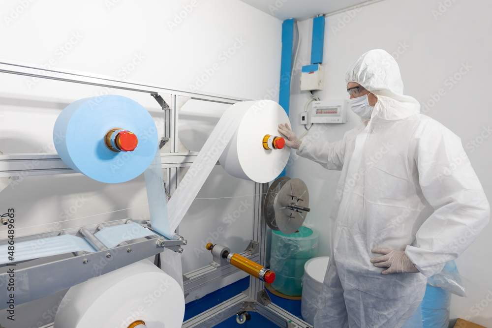 male engineers wearing personal protective equipment uniform(PPE) and ...