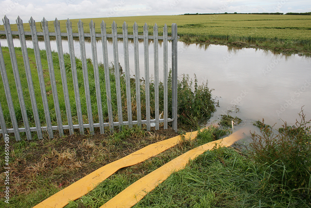 flooded farm and farmland from flash flooding, extreme weather brought ...