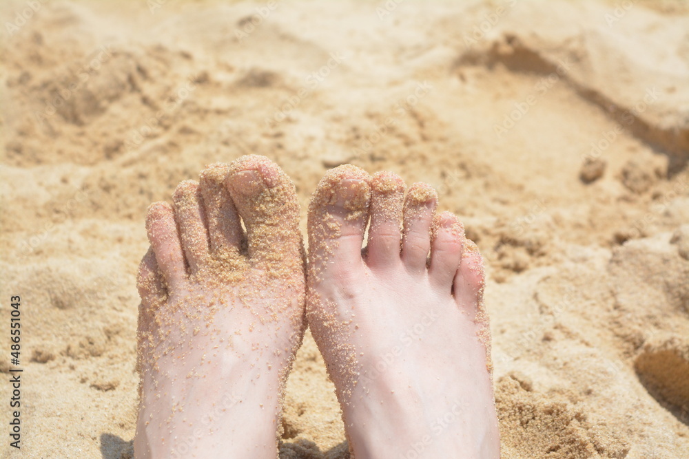 Feet on the sea beach in the sand Stock Photo | Adobe Stock