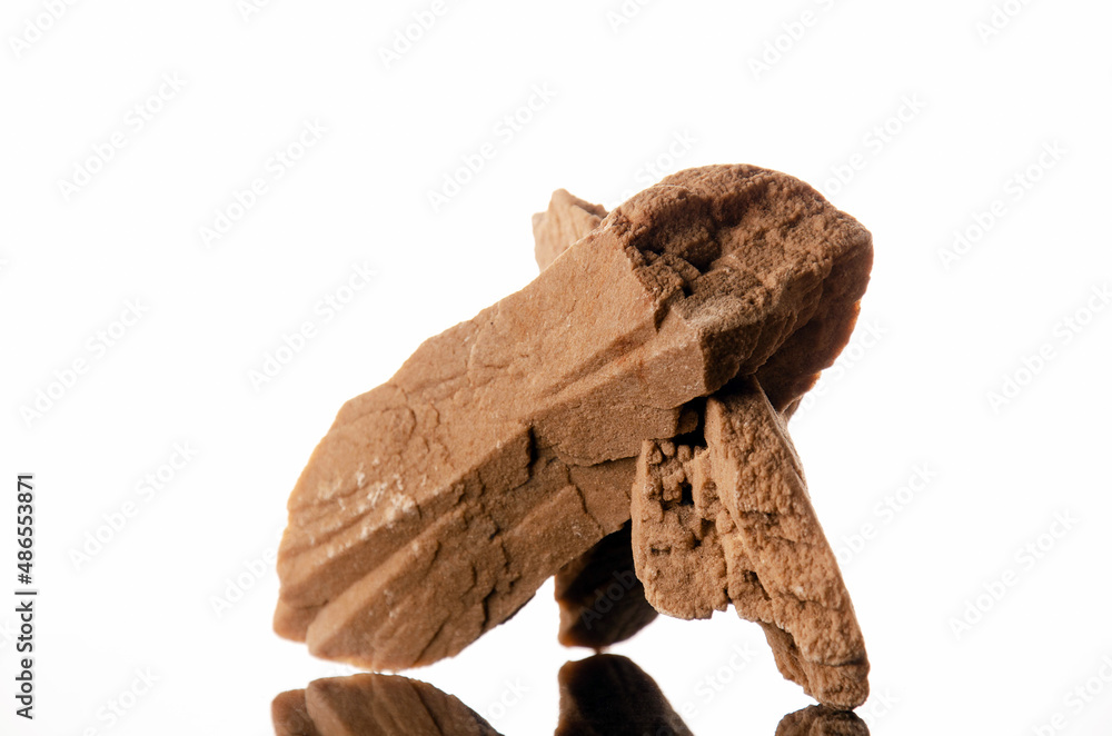 it is a mineral composed of hydrated calcium sulfate; also, a ...