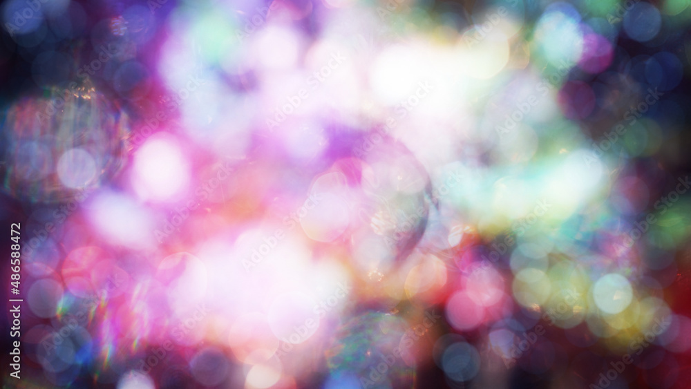 Abstract kaleidoscopic light prism background with bokeh and light leak ...