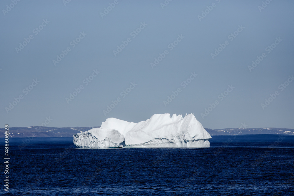 Icebergs floating in the melting sea ice in the Davis Strait. Stock ...
