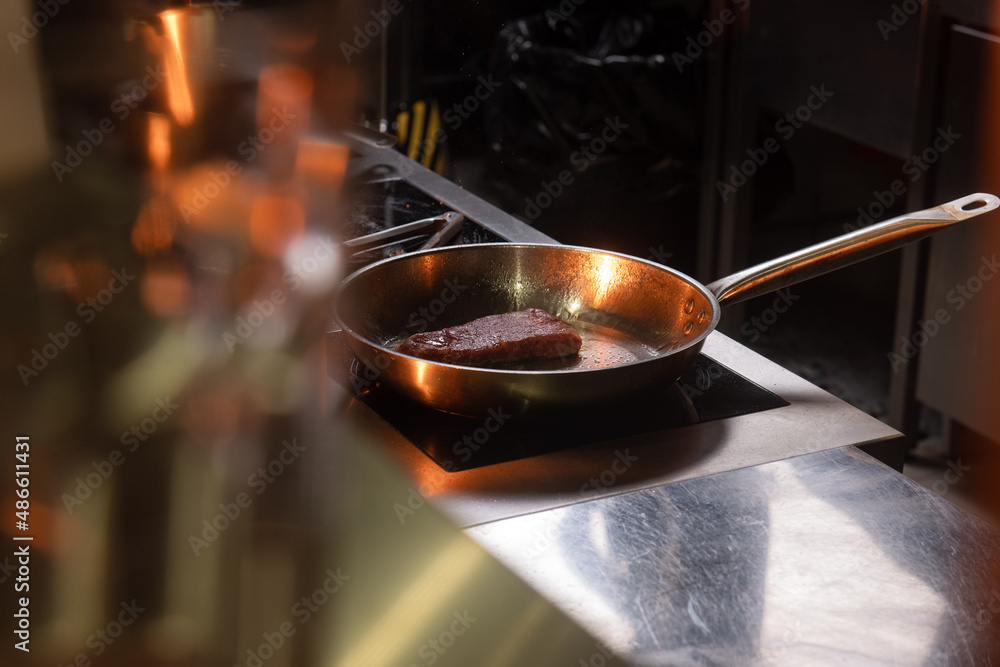 Frying Beef Steak On Pan Stock Photo | Adobe Stock