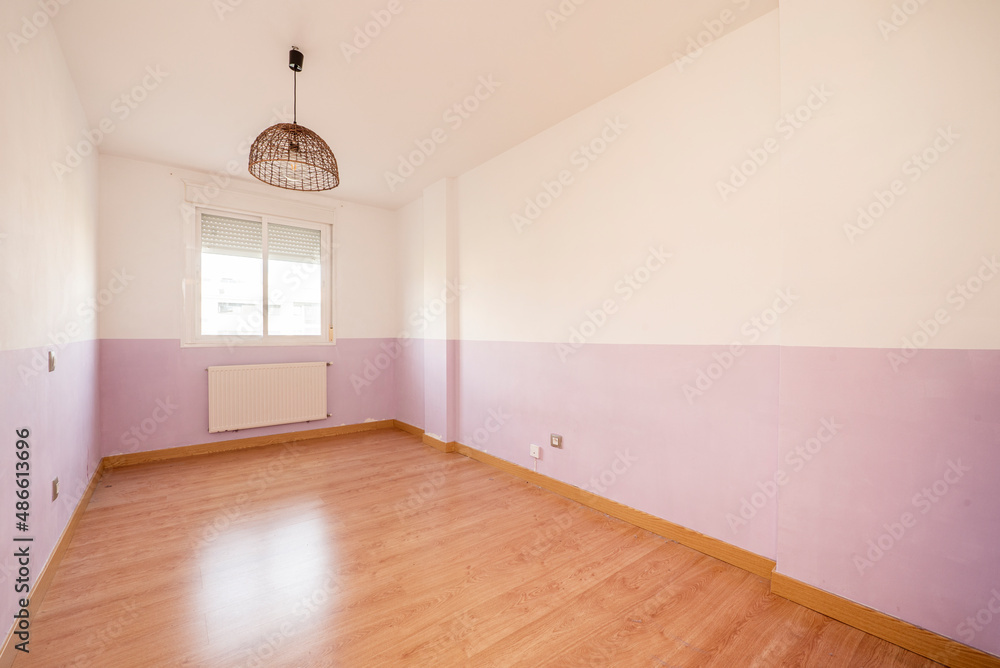 empty room with two types of paint on the walls and French oak woodwork ...