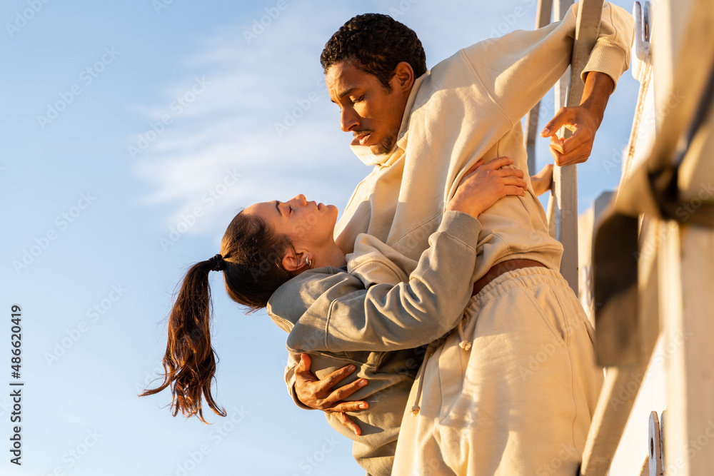 Brave friends helping to climbing truck and hugging Stock Photo | Adobe ...
