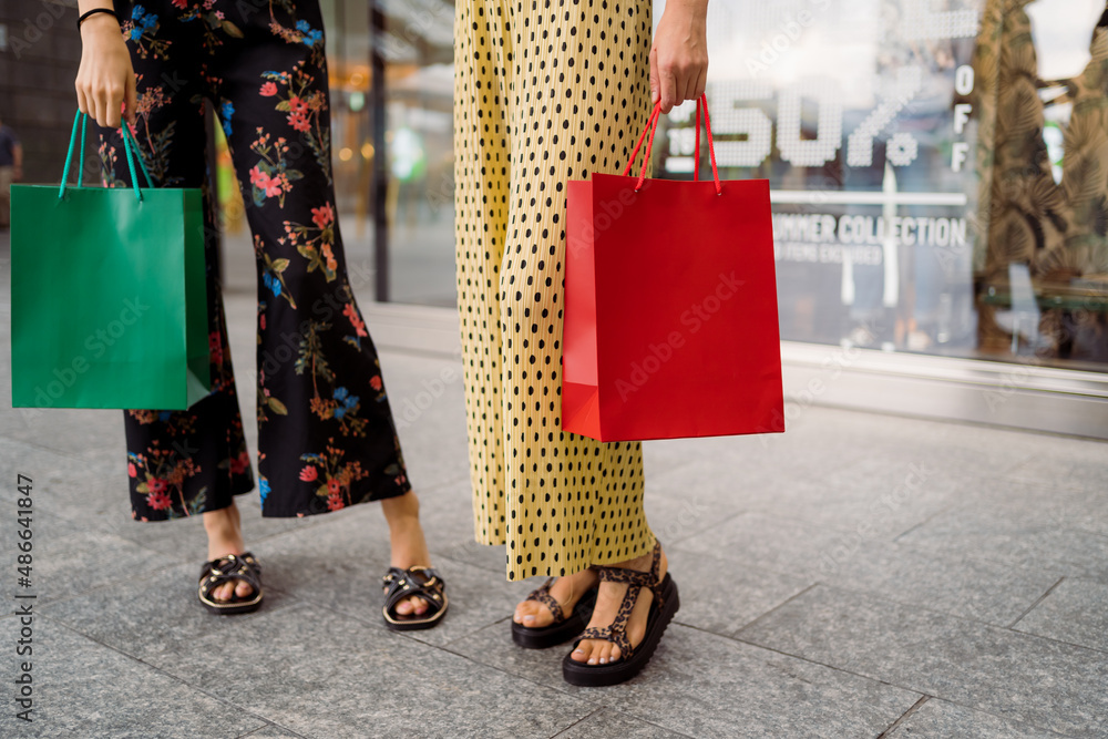 Shopping in a mall Stock Photo | Adobe Stock
