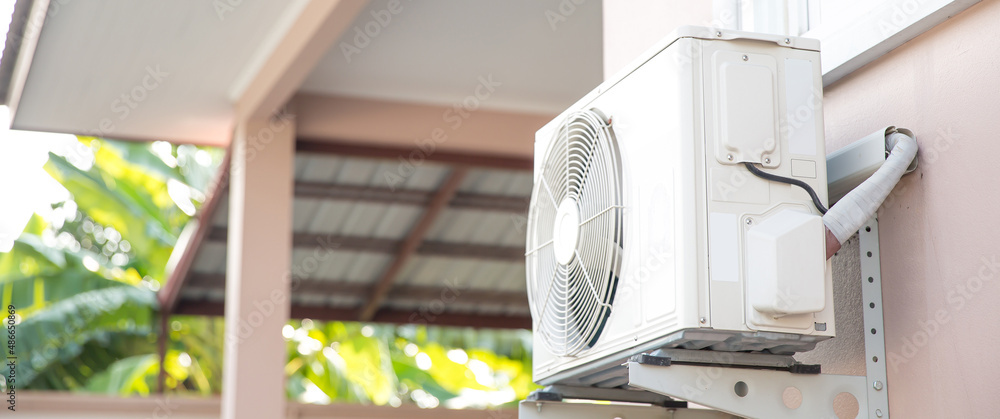 Air compressor, Close-up external split wall type of outdoor home air ...