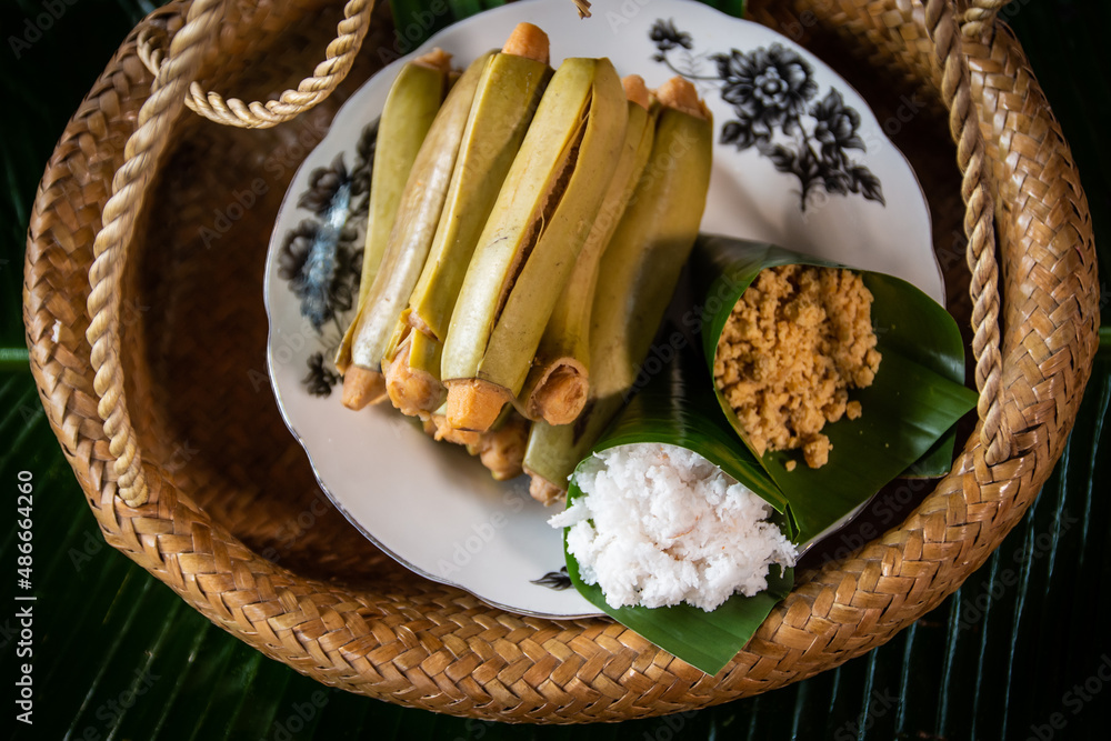 Pisang rebus or boiled banana is traditional snack from country of ...