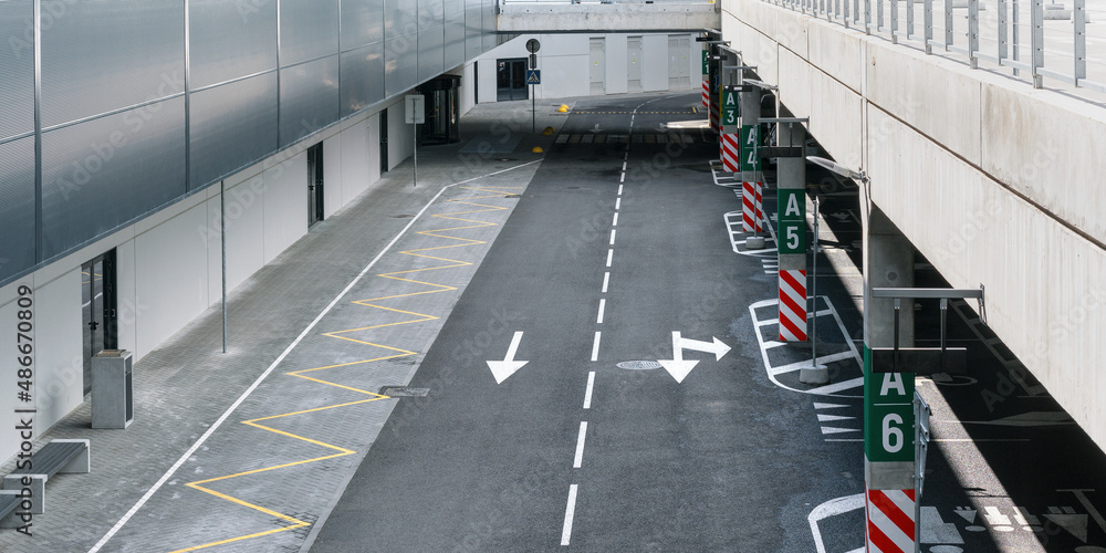 underground parking lot with public transport marked in yellow line and ...