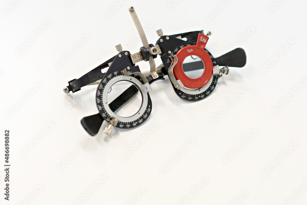 Universal trial frames on a white background. Ophthalmological ...