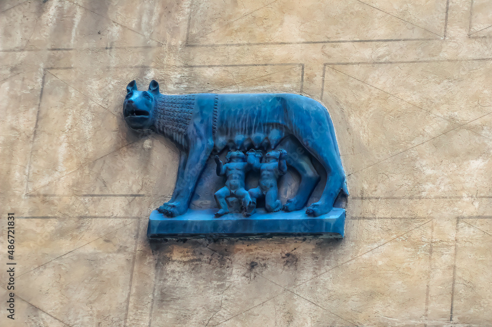 Bas relief sculpture on the building wall of Wolf feeding Romulus and ...