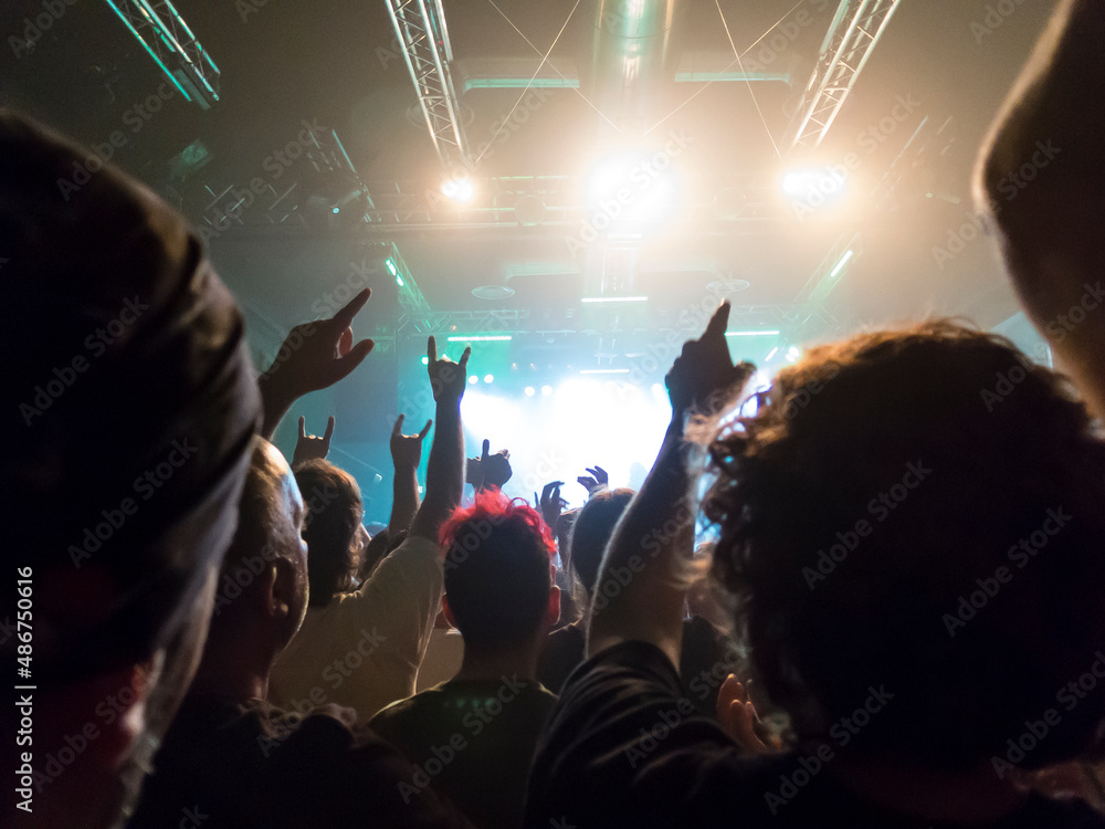 Concert spectators in front of a bright stage with live music Stock ...