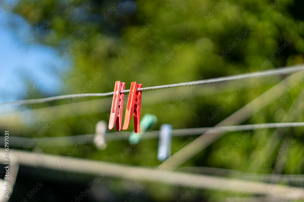 clothes pegs on a clothesline, Traditional hills hoist washing line in ...