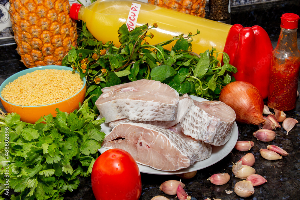 Preparing an Amazonian fish recipe with Jambú (Acmella oleracea ...