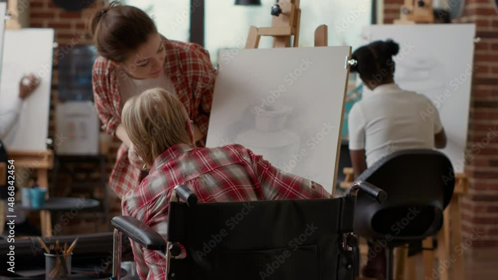 Senior person in wheelchair drawing inspiration model in art class ...