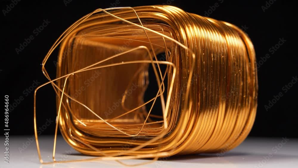 Copper wire of step-down single-phase transformer close-up, chemical ...