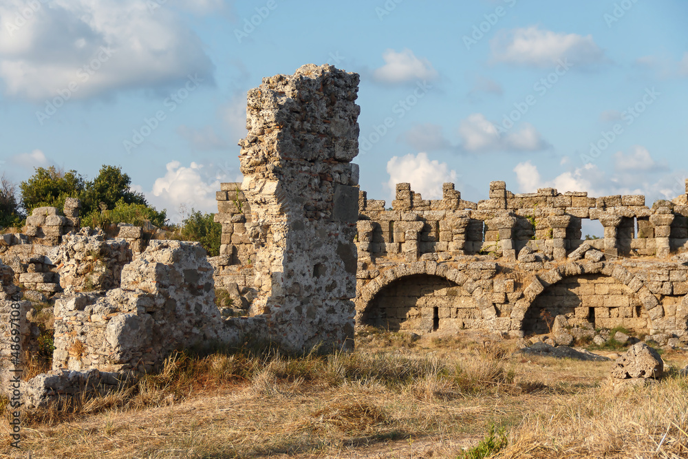 City wall and aqueduc in Side. Ruins of the fortress wall. The ancient ...