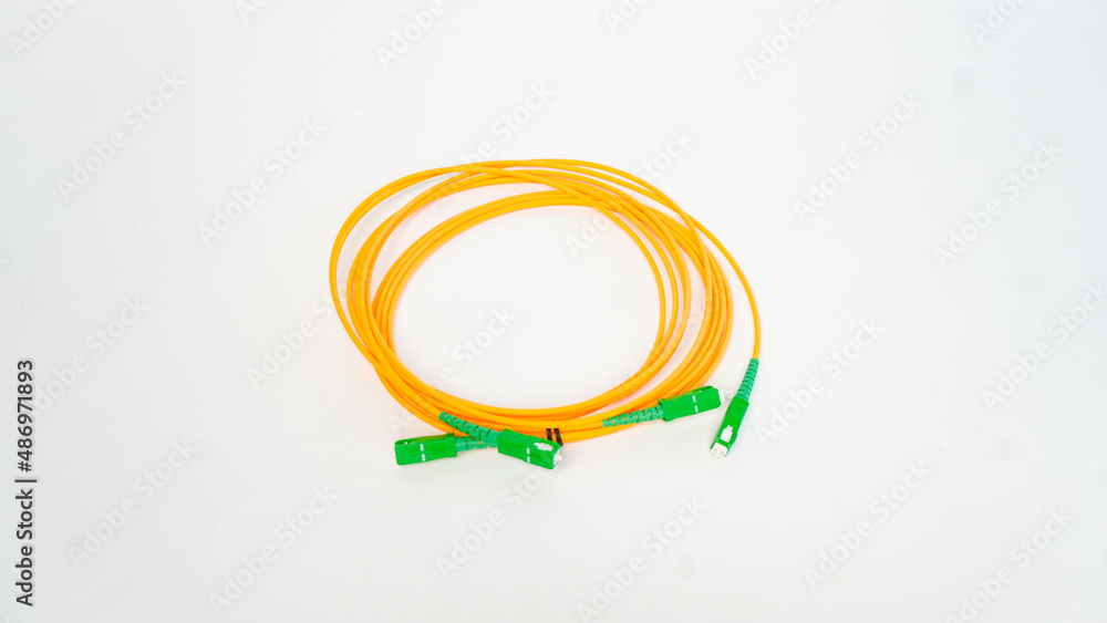 Fiber optic cables isolated on white background.Yellow optic cable with ...