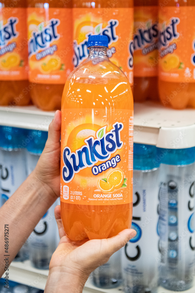 Sacramento CA, USA January 4th 2022 Shoppers hand holding a plastic ...