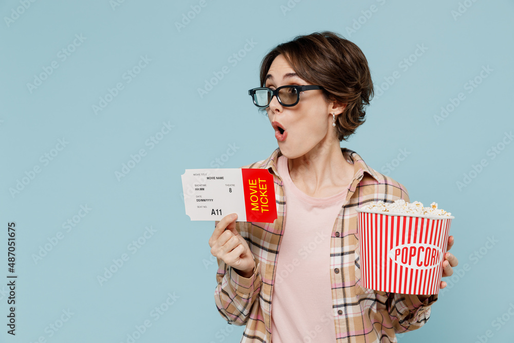 Young surprised amazed shocked woman in 3d glasses watch movie film ...