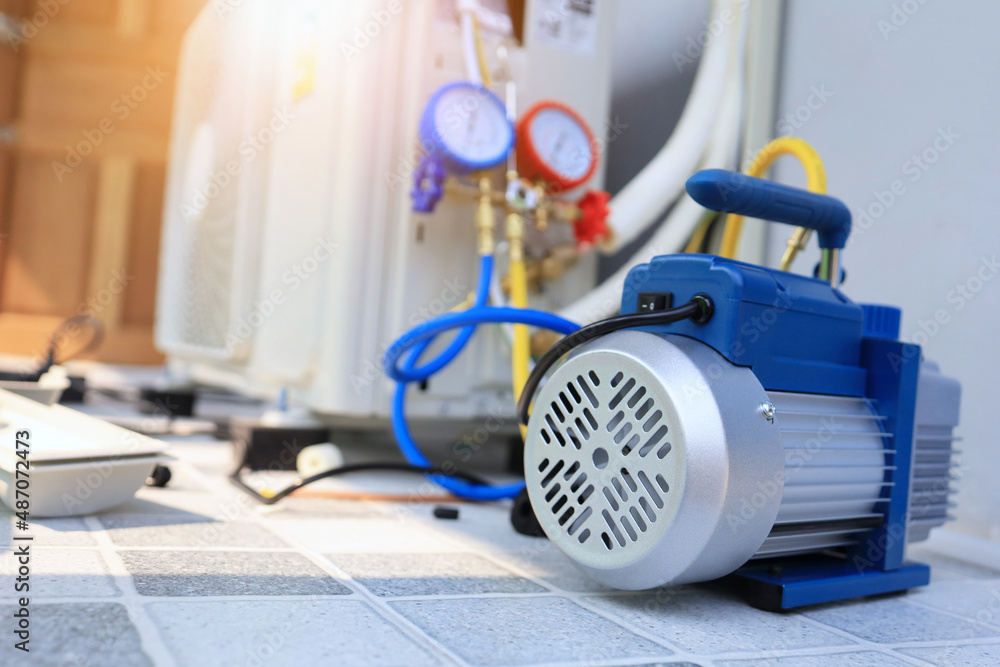 The vacuum pump is used to suck air out of the refrigerant piping ...