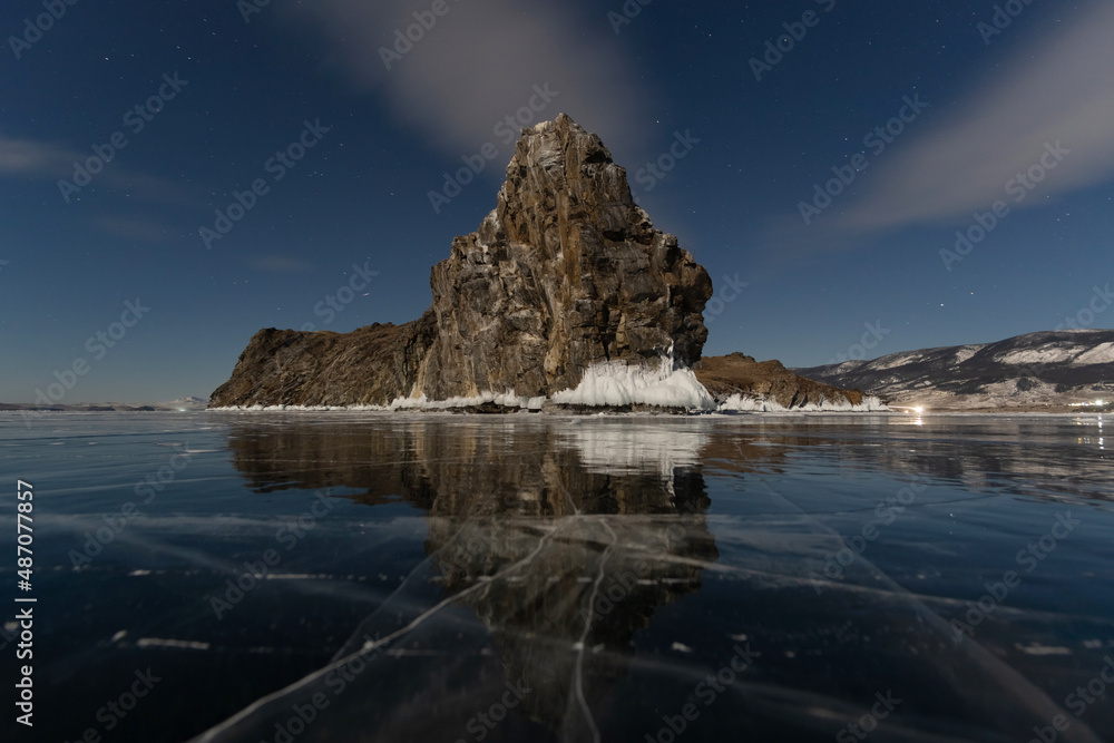 Reflection of the Oltrek island in the surface of the Baikal ice Stock ...