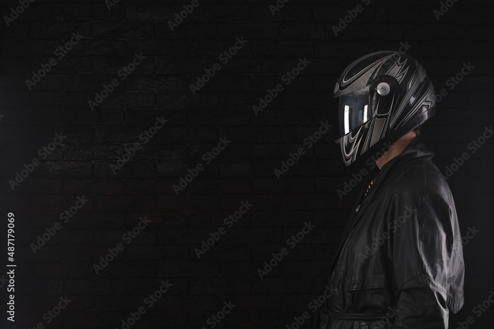 portrait of a professional racer in a motorcycle helmet Stock Photo ...