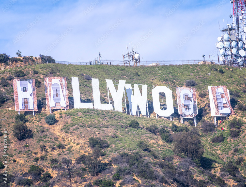 Los Angeles, CA, USA - February 14, 2022: Crews change the letters to ...