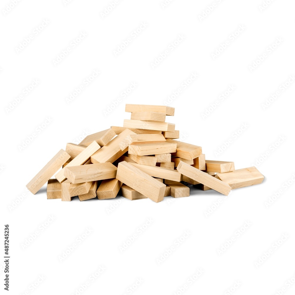 Jenga tower made of wooden blocks falling on thee background Stock ...