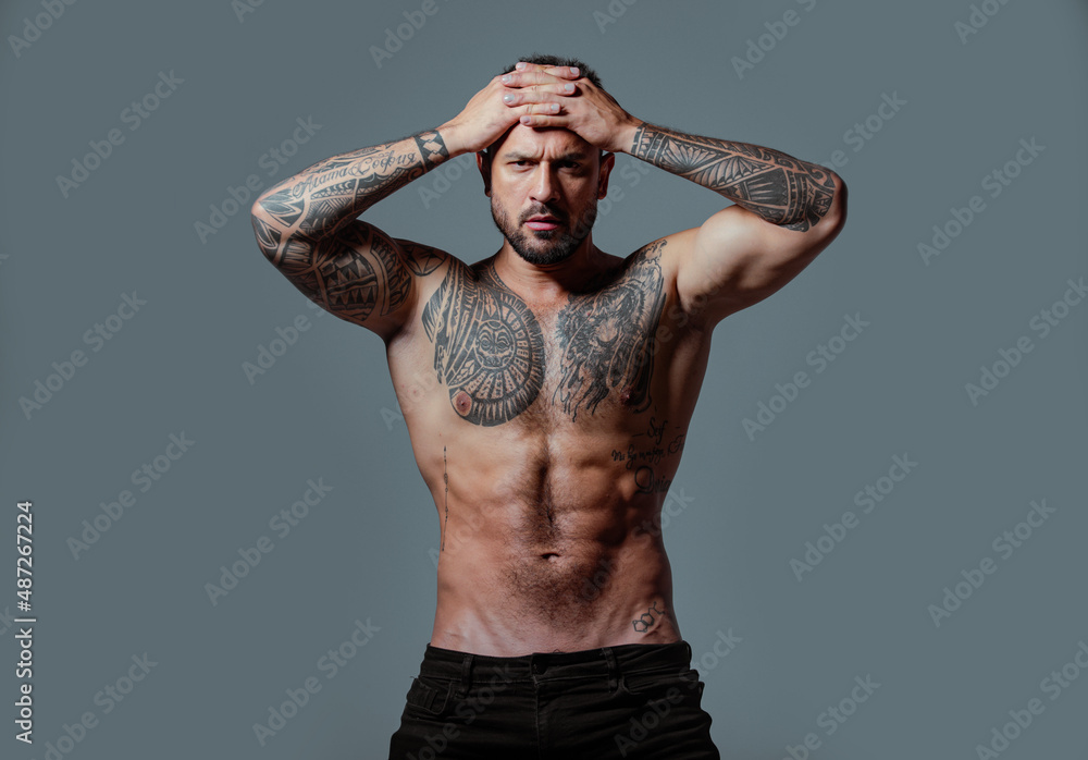 Portrait of handsome man with sad and fear expression. Strong muscular ...