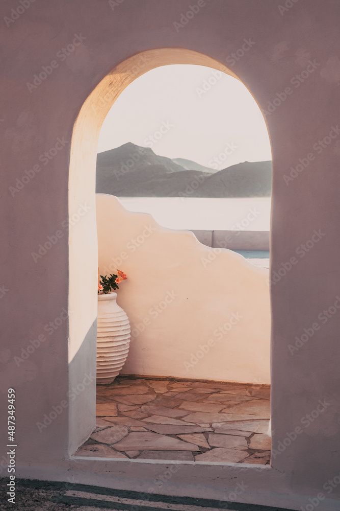traditional Greek door opening to the sea Stock Photo | Adobe Stock