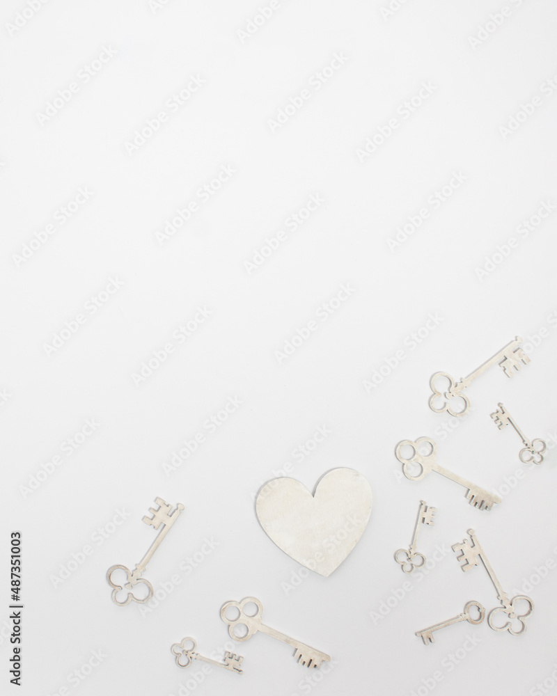 Pure white heart with set of keys on the corner on the white background ...