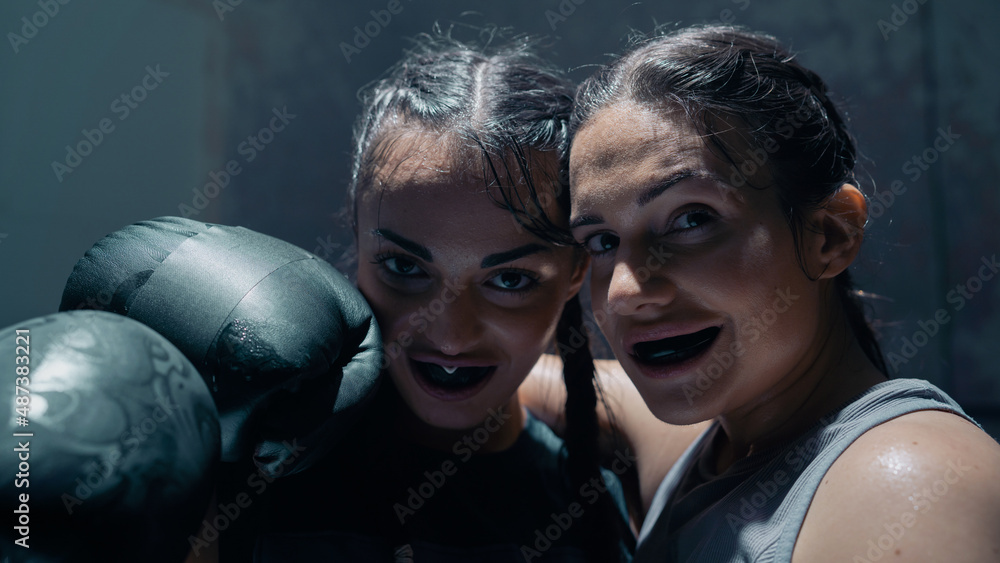 Portrait Shot of Two Female Kick Boxers Hugging Each Other, Wearing ...