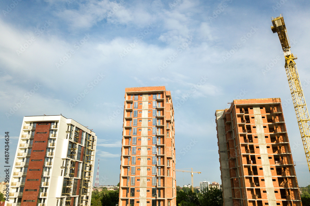 High-rise residential apartment buildings and tower crane under ...