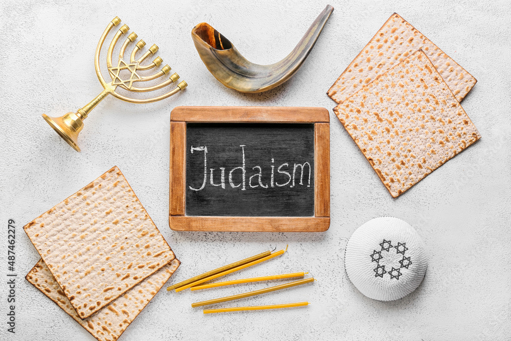Composition with symbols of Judaism on light background Stock Photo ...