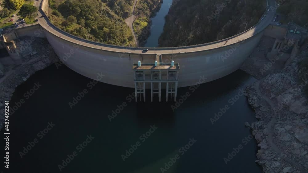 4K aerial view of a Portuguese water dam. Flying above the Barragem do ...