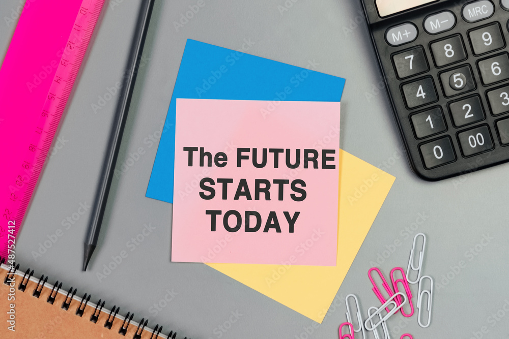 The future starts today - text on sticky note. Top view image of pink ...
