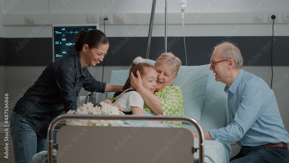 Family surprising retired patient with flowers and visit in hospital ...