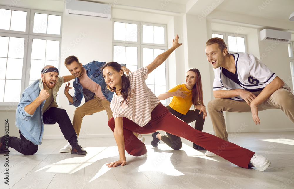 Group of cheerful young people dancing and having fun. Happy street ...
