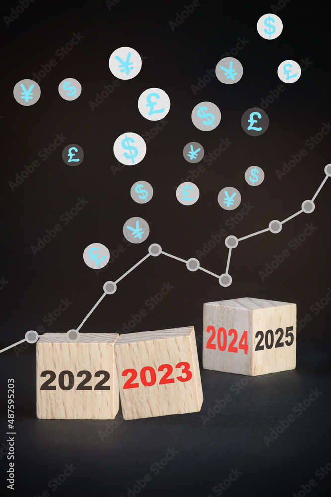 New year 2022, 2023, 2024, and 2025 written on wooden cubes with ...