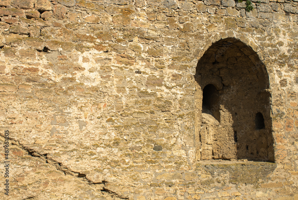 Holes for medieval guns in a defensive fortress. Space for protection ...