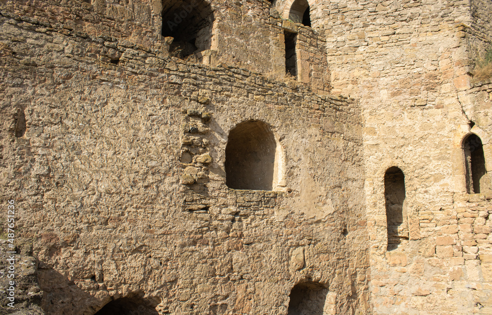 Holes for medieval guns in a defensive fortress. Space for protection ...