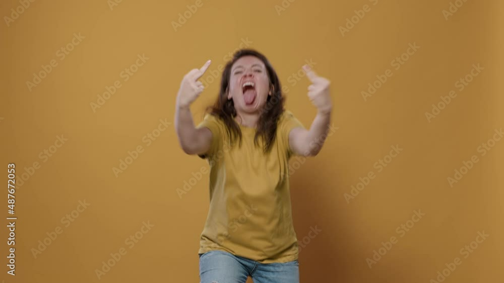 Angry woman showing middle finger obscene hand gesture having ...