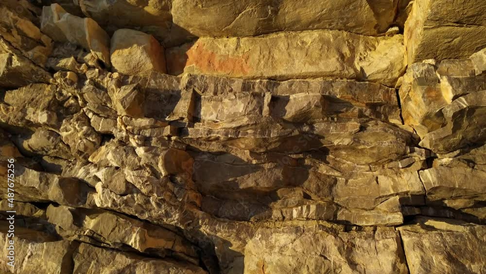 Cliff - rugged dipping sedimentary rock mountain formation. Vertical ...