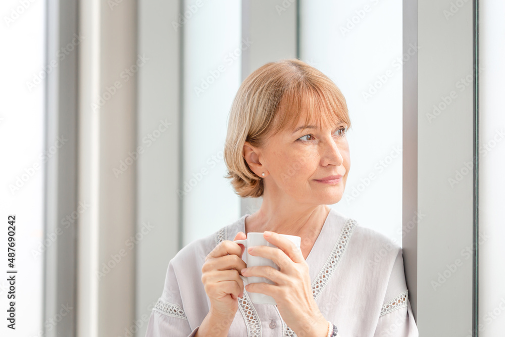Portrait of Relaxing woman inside new home during a coffee break, Woman ...