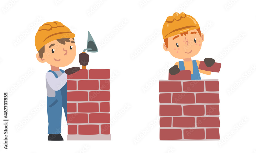 Kid builders working with construction tools set. Boys in overalls and ...