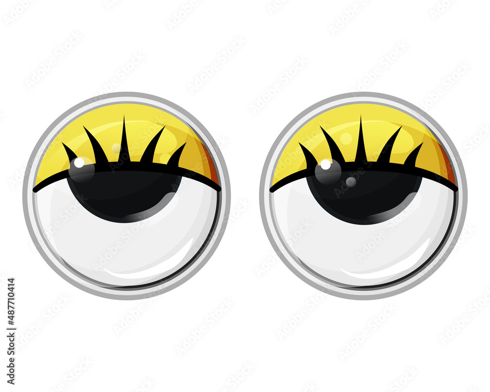Plastic eyes with eyelashes and yellow eyelids on a white isolated ...