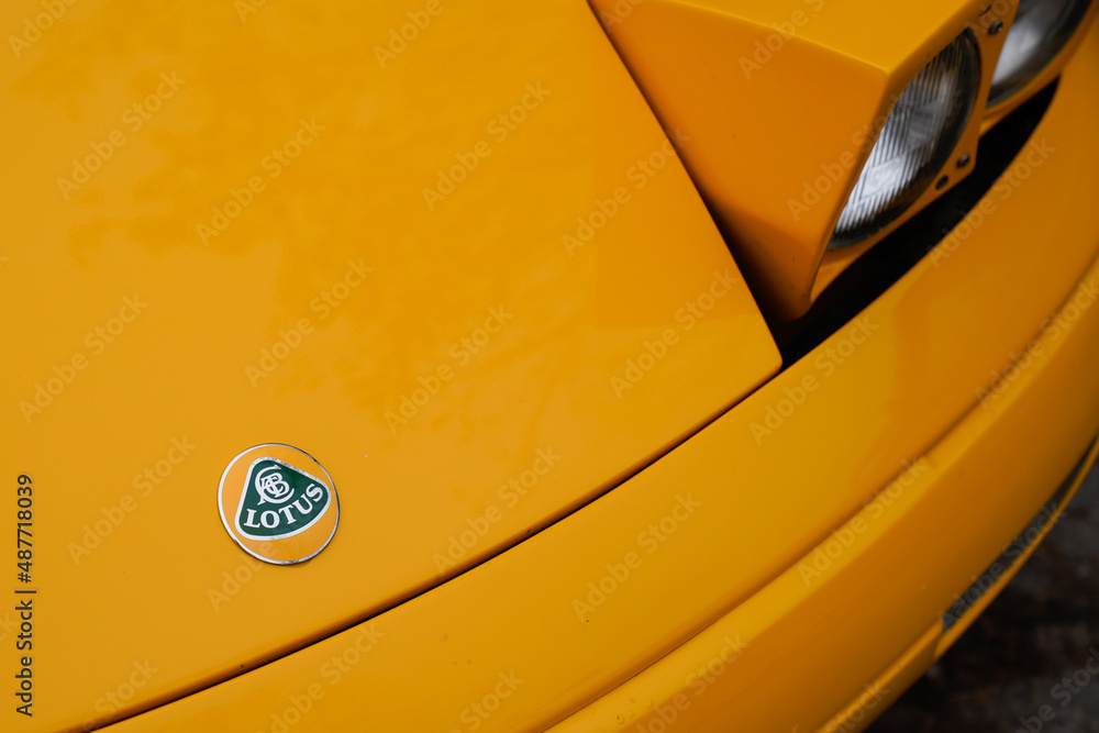 Lotus logo text and brand sign Car yellow vintage oldtimer Stock Photo ...