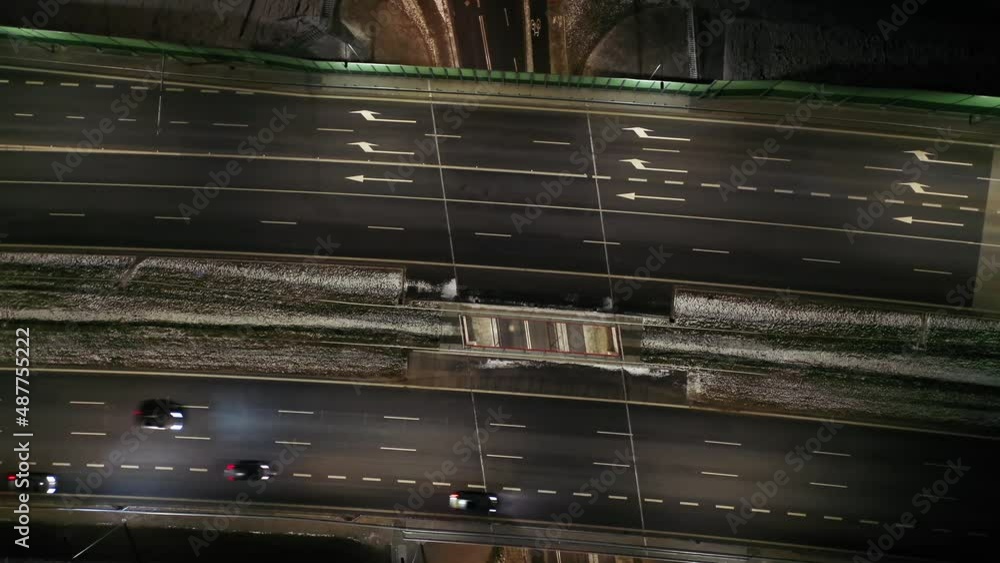 Top down night city roads with cars driving aerial view. Nightly urban ...