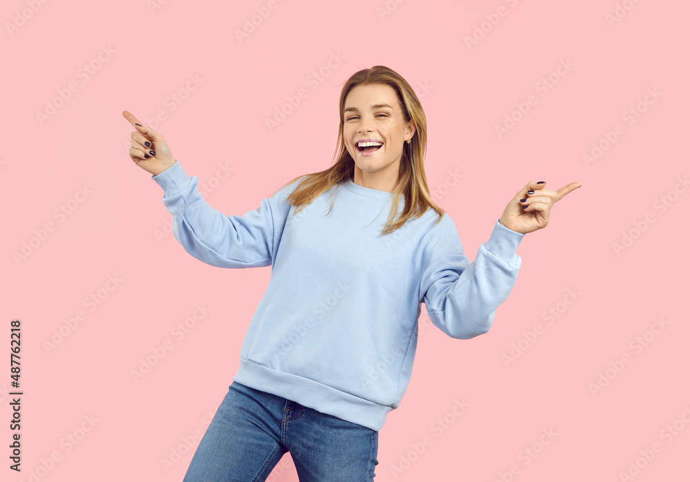 Cheerful teenage girl laughing, having fun and dancing, isolated on ...